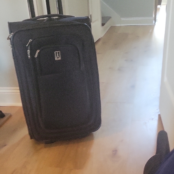 Travelpro | Bags | Travelpro Black Rolling Suitcase | Poshmark